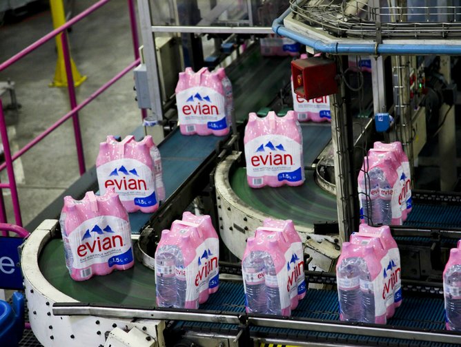 Danone's Evian to use 100% recycled plastic in its bottles by 2025 ...